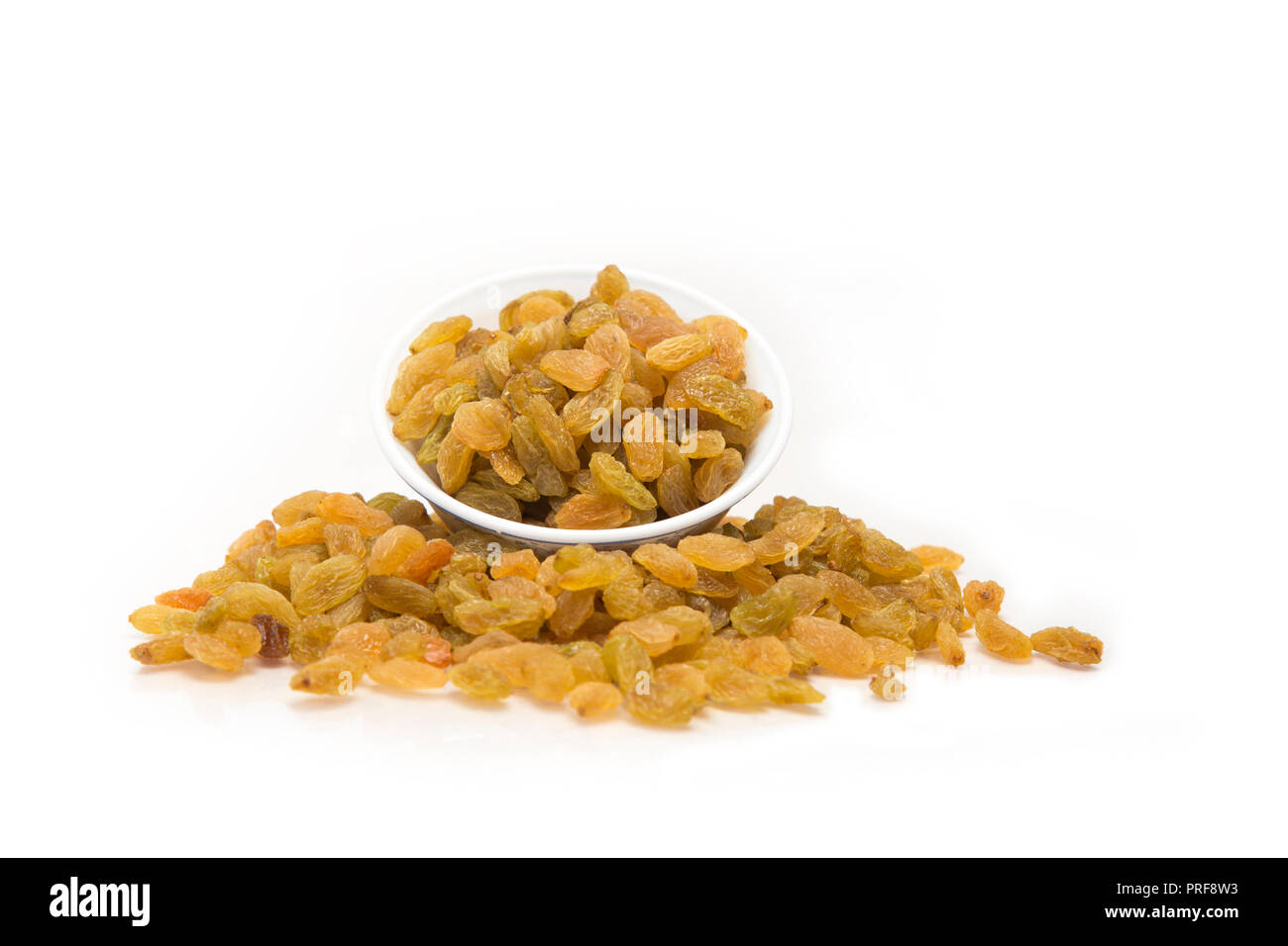 Sweet Raisins white bowl isolated on white background Stock Photo - Alamy