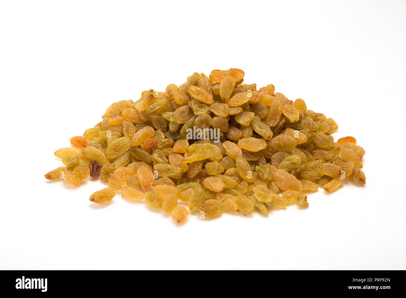 Organic dried raisins isolated on white background Stock Photo - Alamy