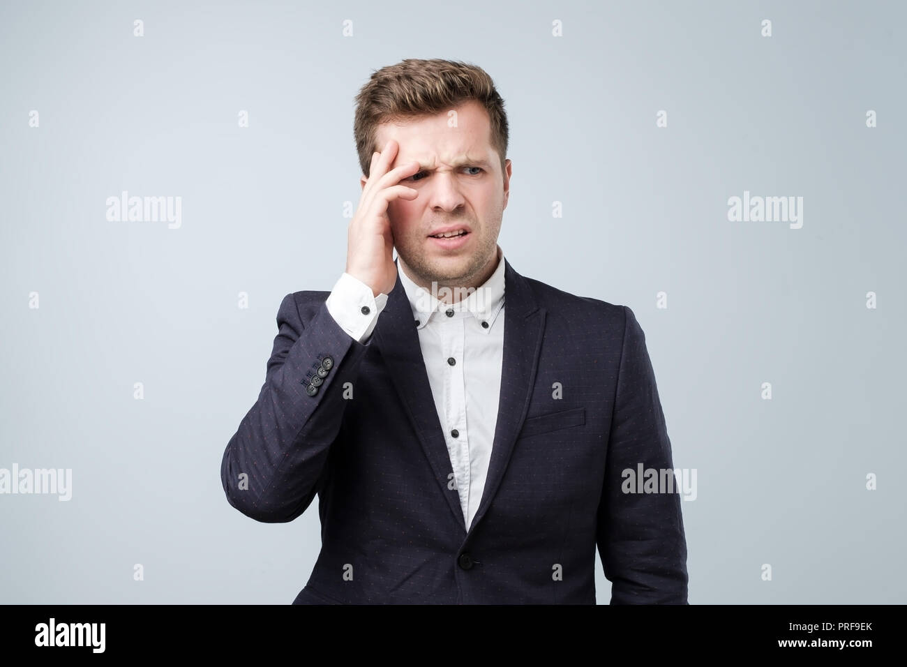 Headache handsome young man hi-res stock photography and images - Alamy