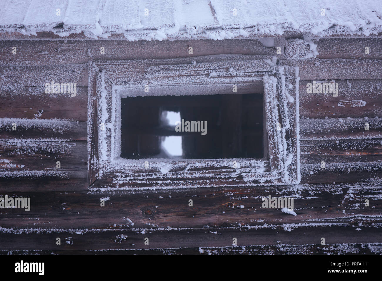 Window in an old house. Hoarfrost on wooden walls. Color toning Stock ...