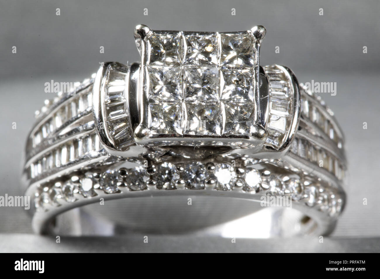 A diamond engagement ring in a box with glint/reflection. Shimmering ...