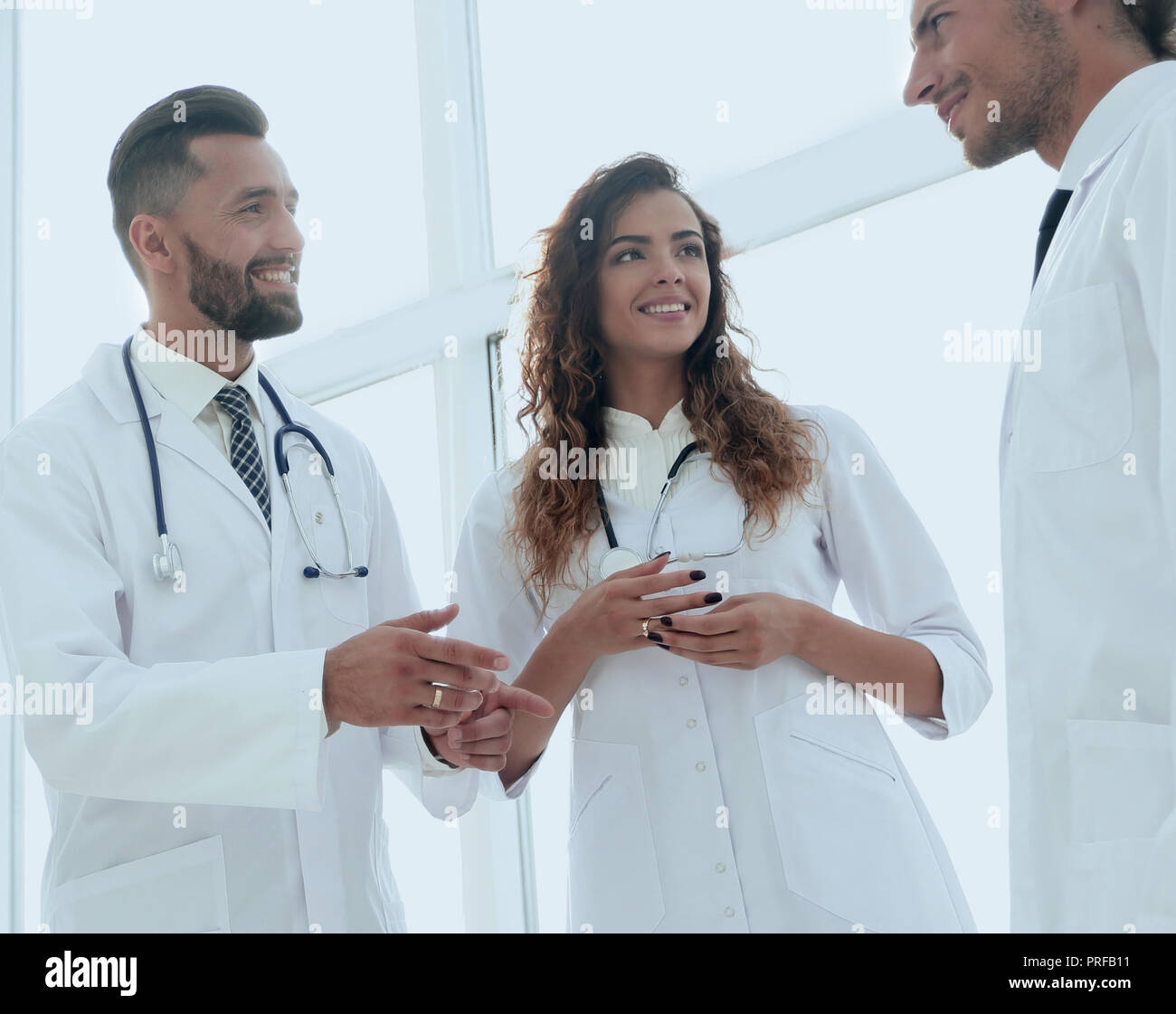 closeup of a group of doctors discussing Stock Photo - Alamy