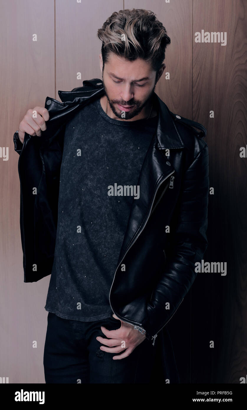 Muscular man in leather jacket hi-res stock photography and images - Alamy