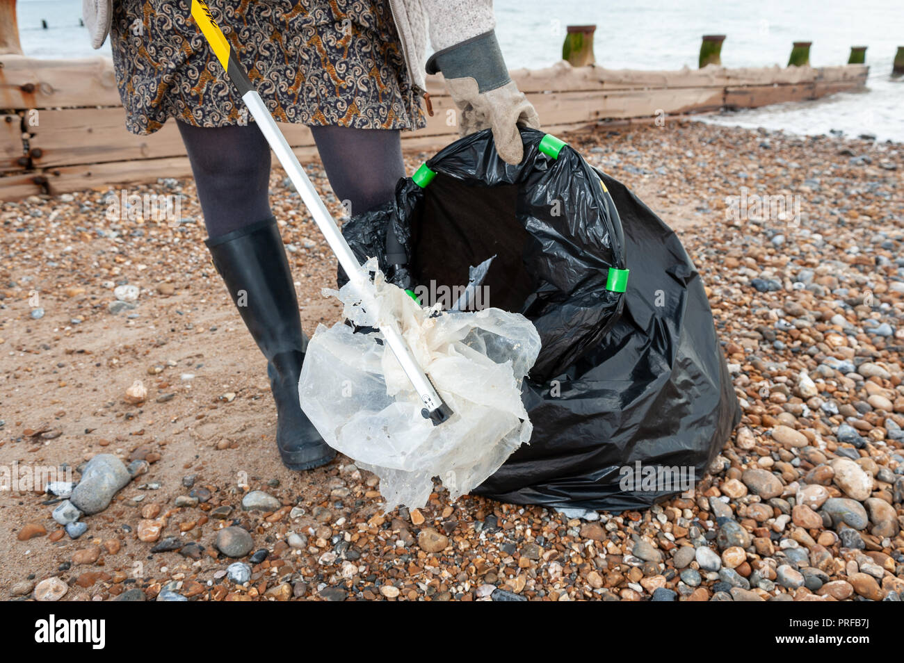 Picking Up Beach Litter Stock Photos & Picking Up Beach Litter Stock ...