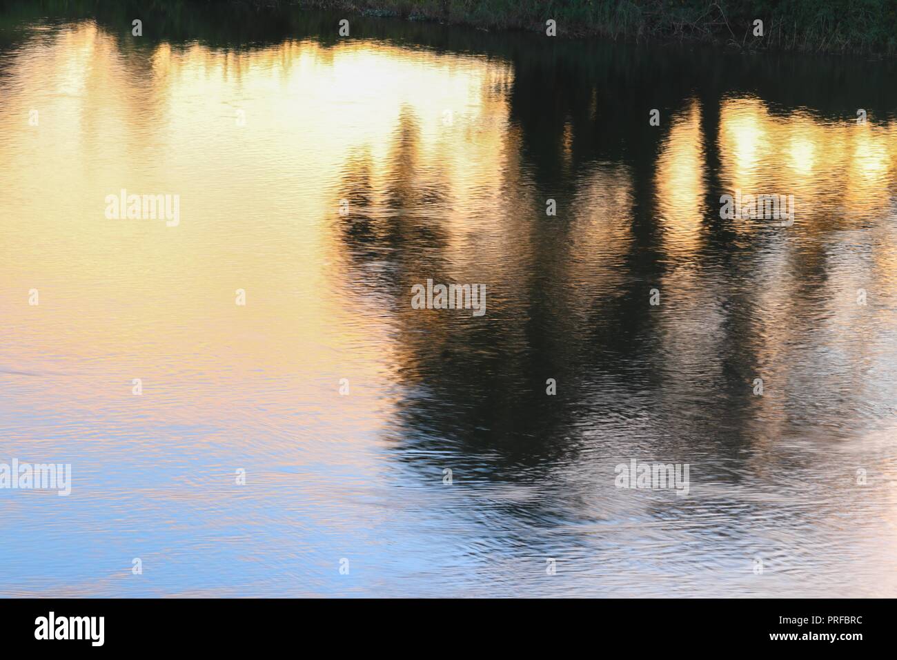 Colorful Water texture reflex beautiful colored sky in evening Stock ...
