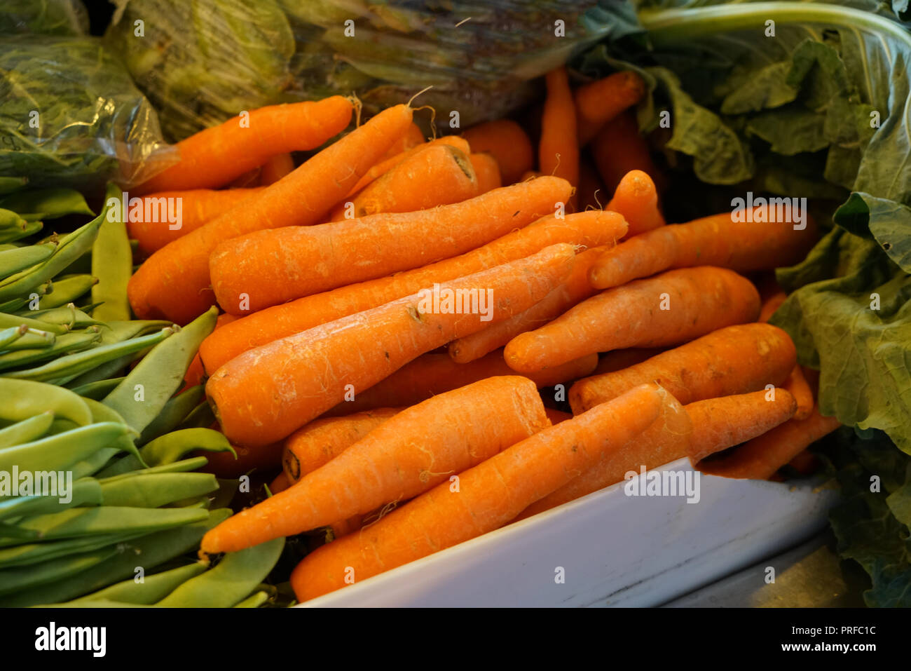 A vegetable market in Portugal offers colorful fruits and vegetables ...