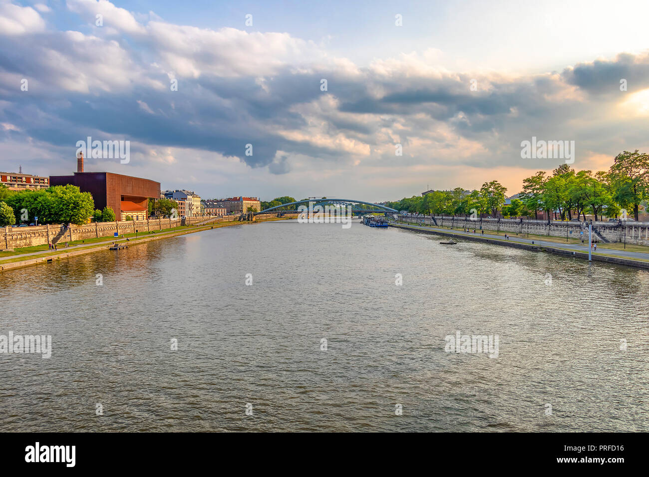 Krakow skyline with Father Bernatek Footbridge across the Vistula river ...