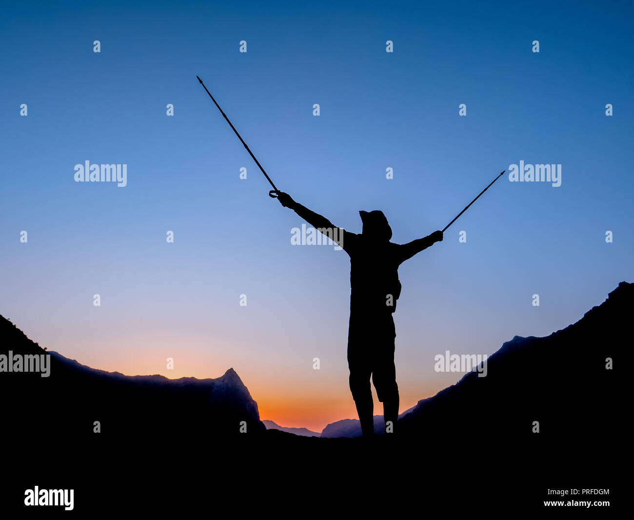 Silhouette of hiker in mountain Stock Photo - Alamy
