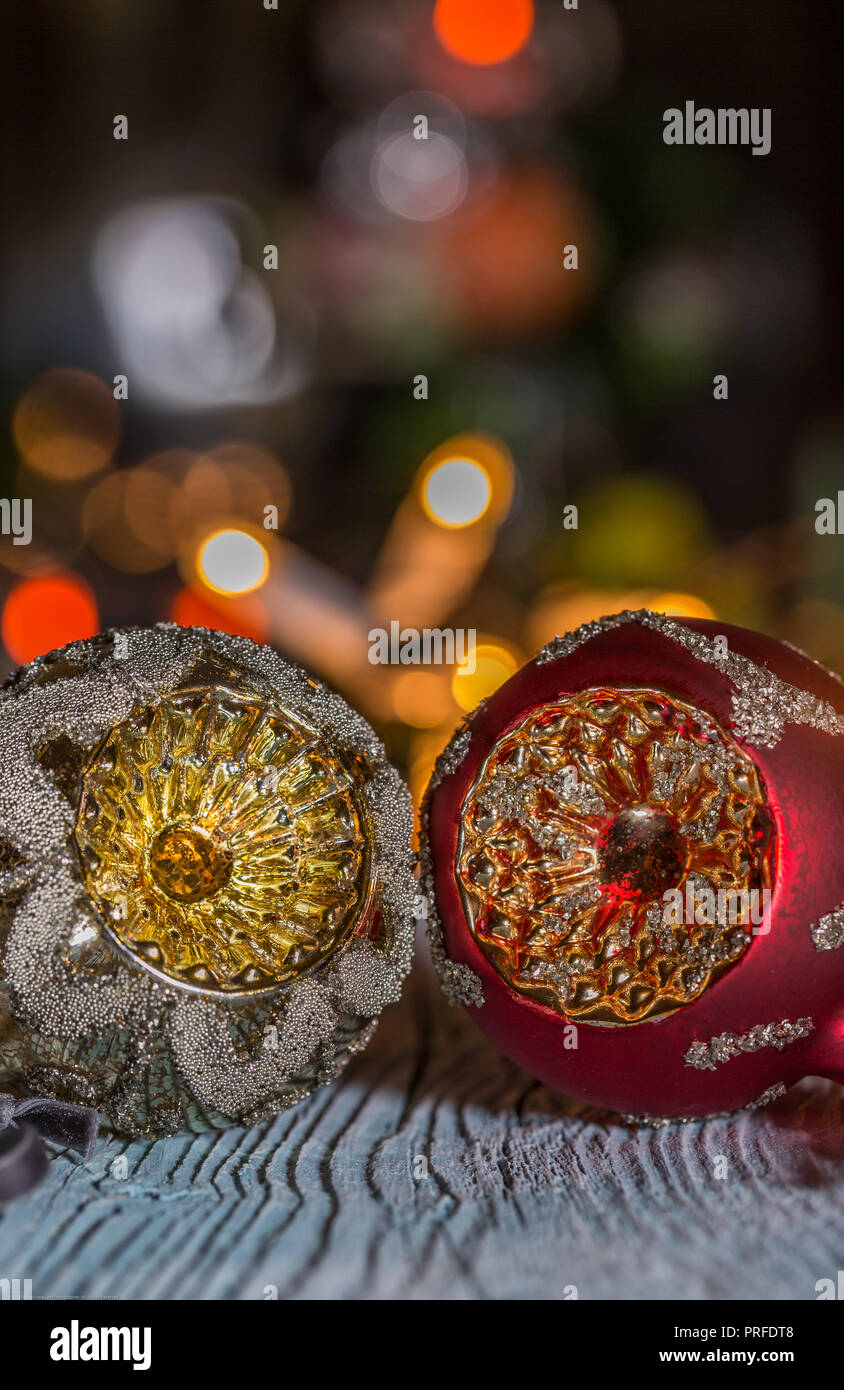 Two Christmas Baubles on Wooden Table and lights background Stock Photo ...