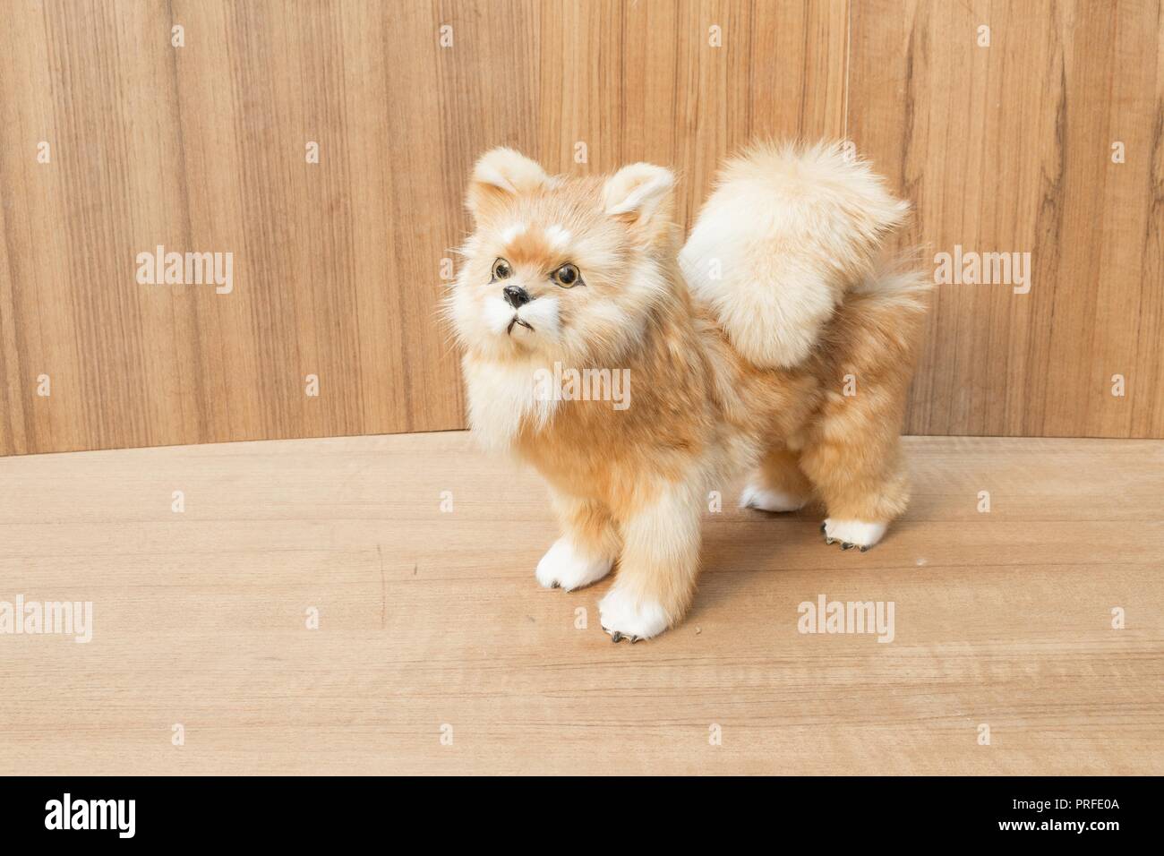 doll dog toy cute beautiful on wooden floor background Stock Photo - Alamy