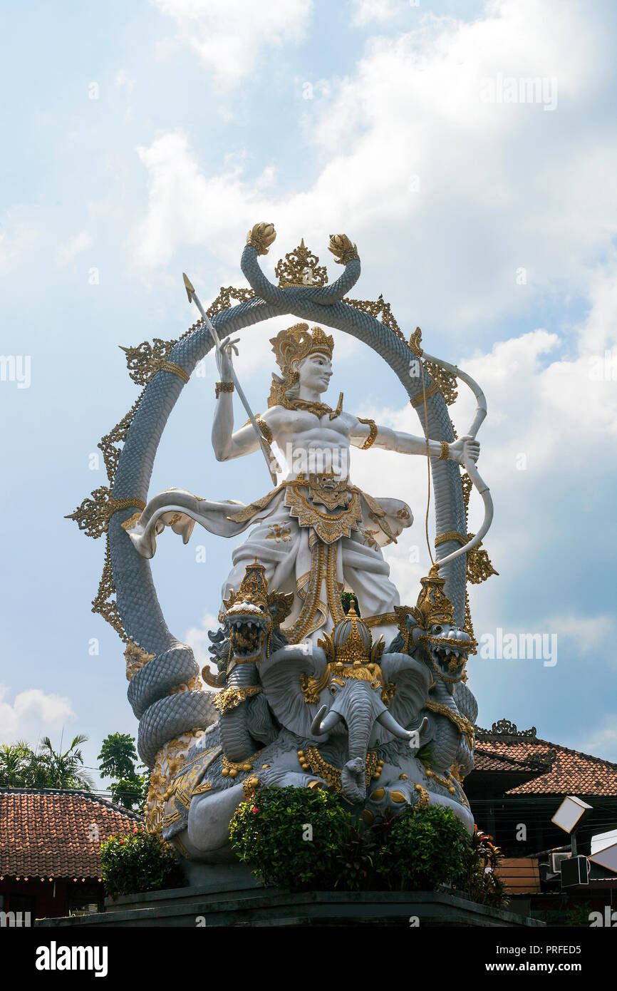Large white street statue Arjuna at crossroads in Ubud, Bali Stock ...