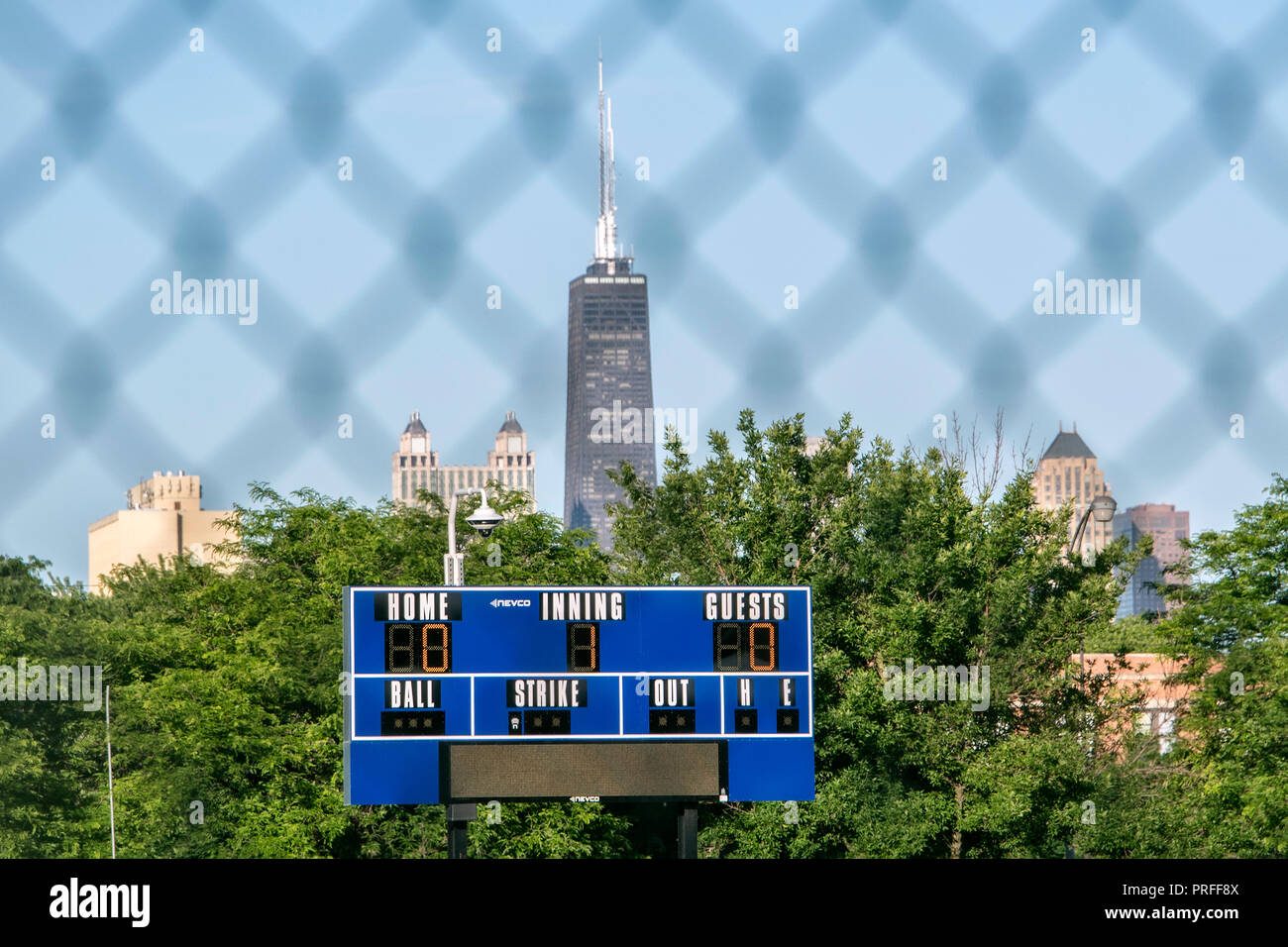 Scoreboard at a baseball field with the John Hancock Tower in the ...