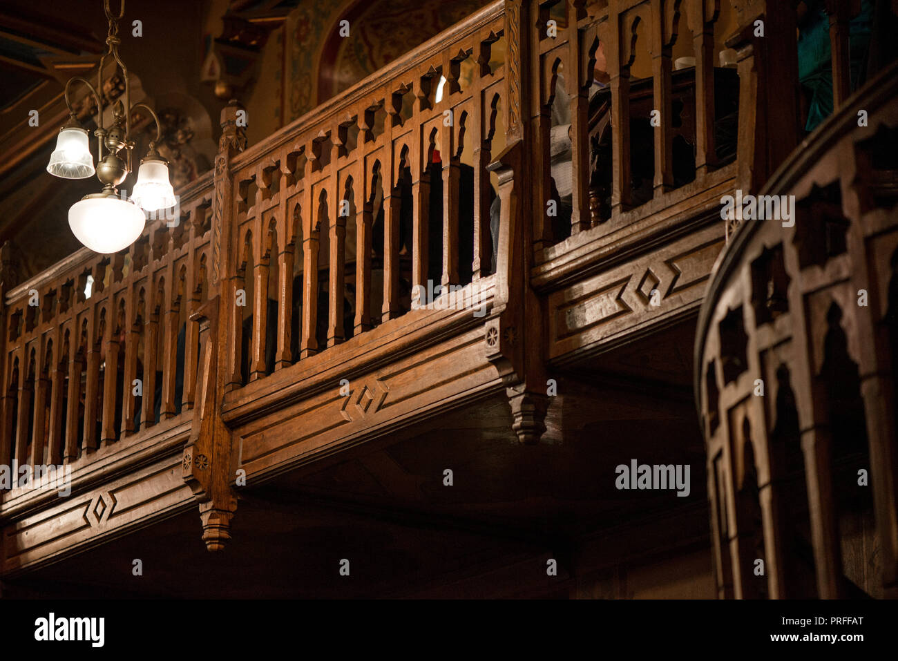 Abstract dutch angle shot of old, vintage theatre balcony wooden ...