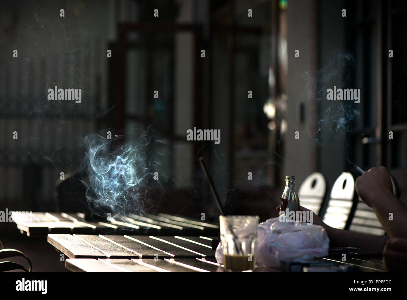 Minors smoking in a public venue, discussing the regulation of tobacco ...