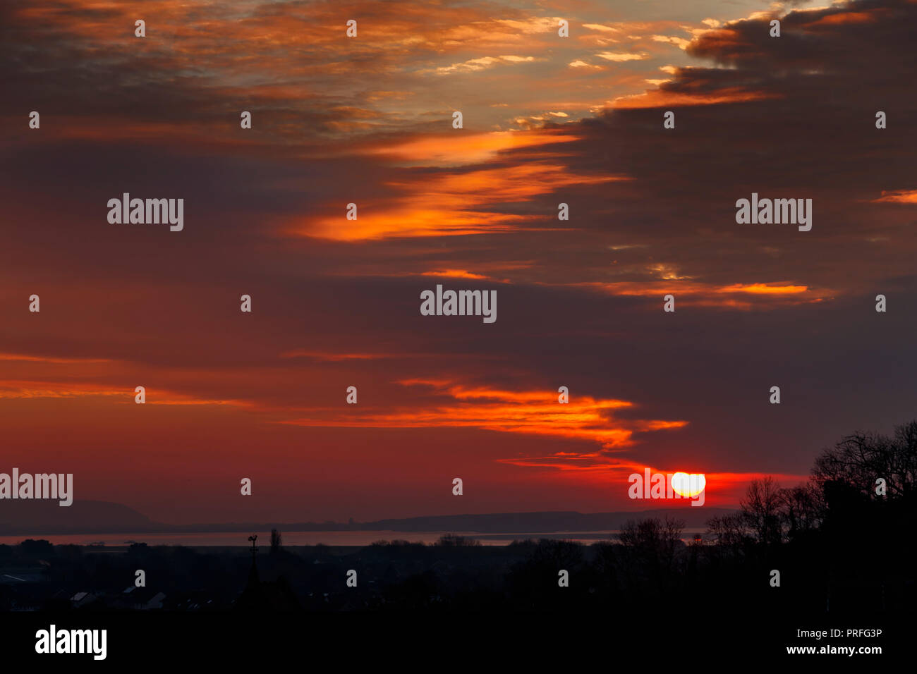 The sun about to set Stock Photo - Alamy
