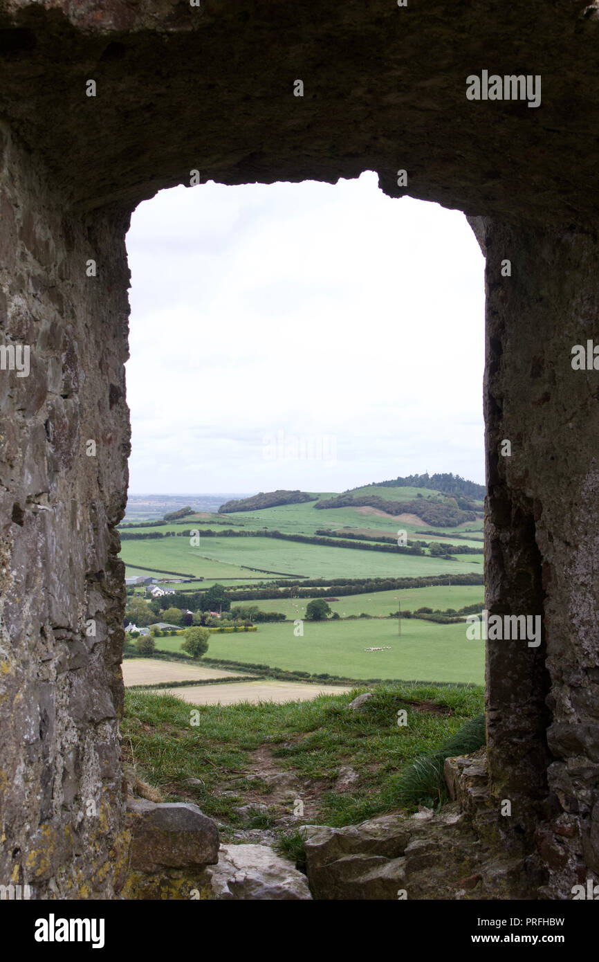 Close up view of an arched stone window in a medieval castle ruins in ...