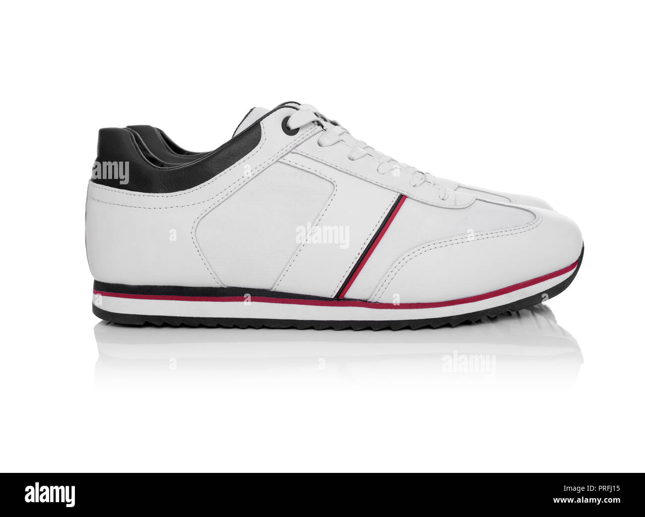 White sneakers isolated on a white background Stock Photo - Alamy