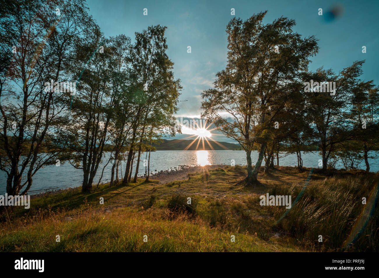 Sunset on Loch tarff Stock Photo - Alamy