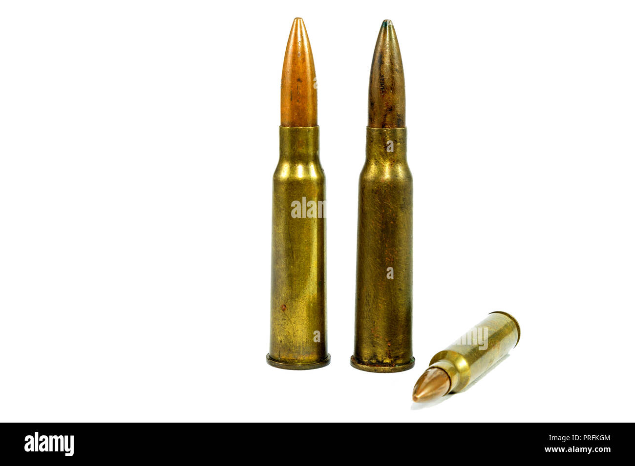 Two large ammunition balls and one small ammunition ball stacked with a ...