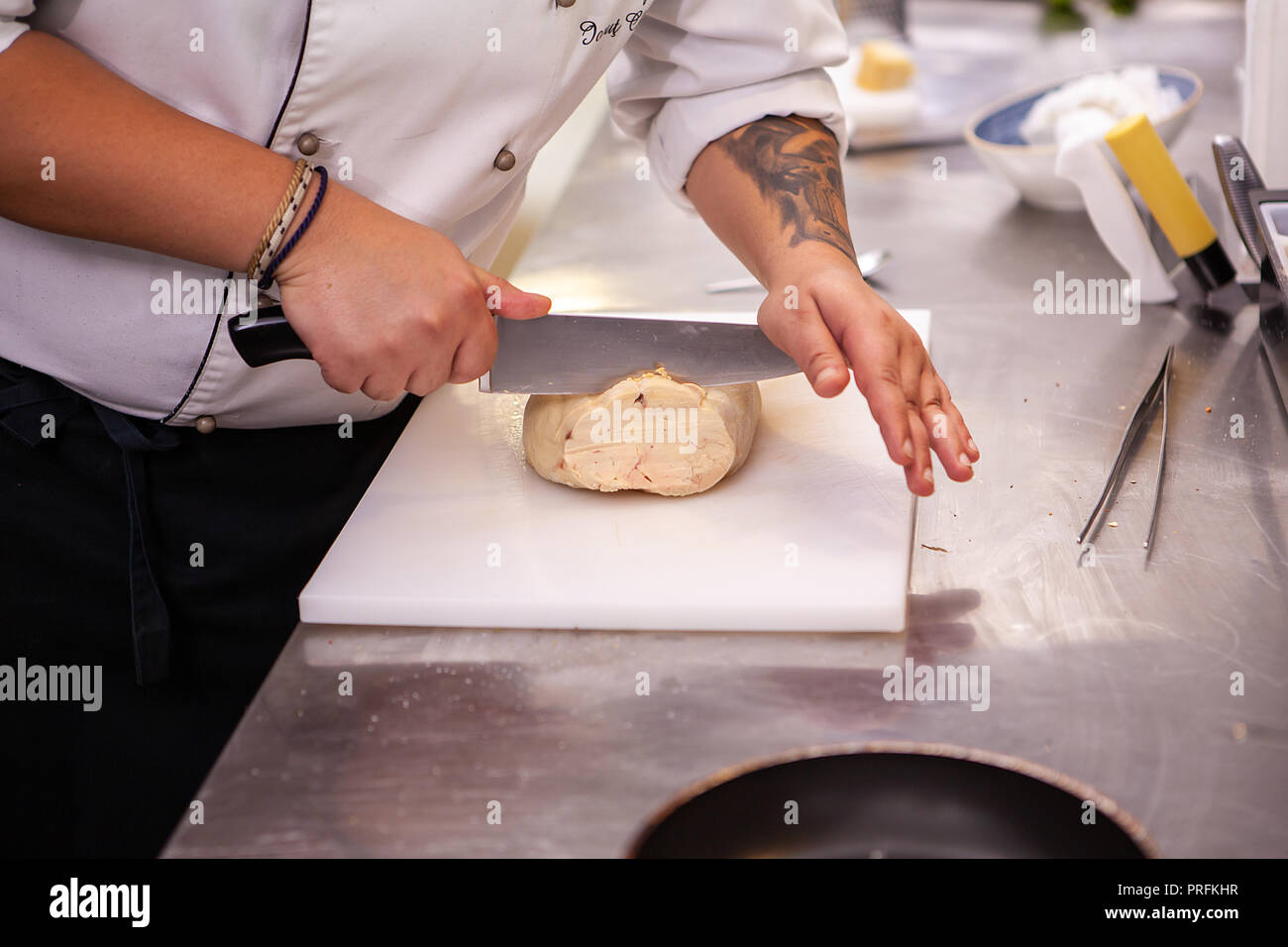 Chef slicing whole Foie Gras in his restaurant kitchen Stock Photo - Alamy