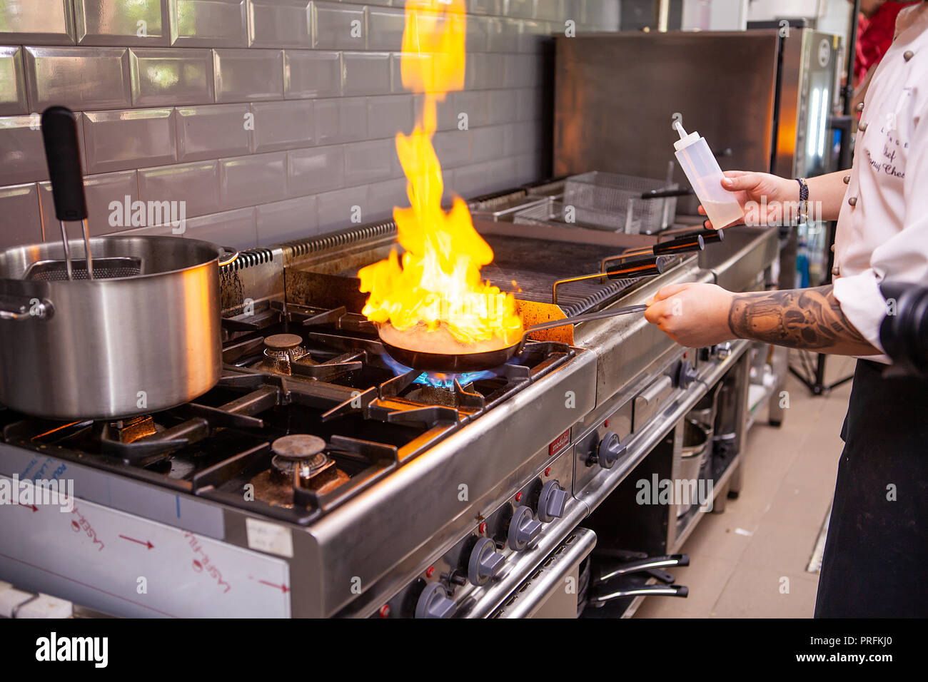 Flaming pan hi-res stock photography and images - Alamy