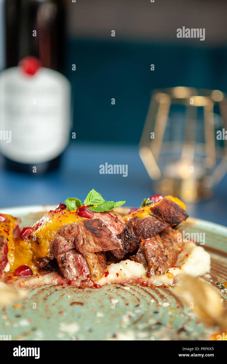 Fine dining design in restaurant with good red wine. Tasty gastronomy ...