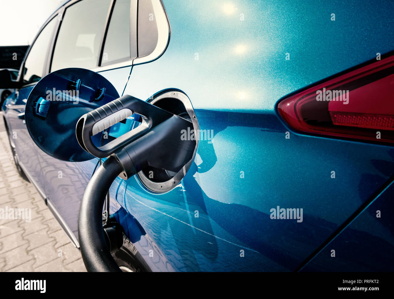 Charging the battery of an electric car Stock Photo - Alamy