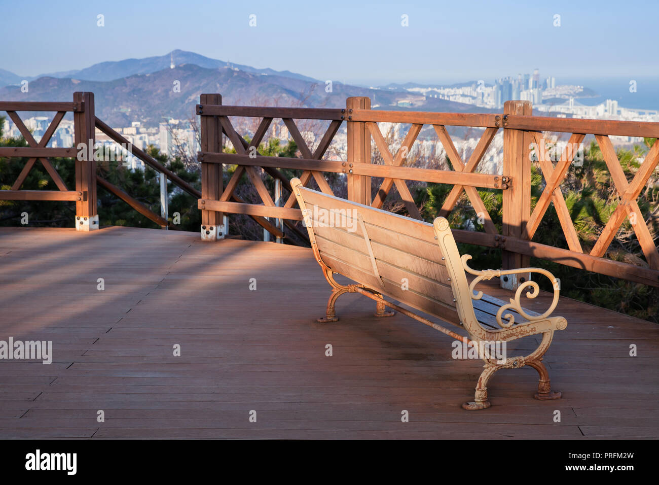 Wooden bench in mountain park of Busan city, South Korea Stock Photo ...