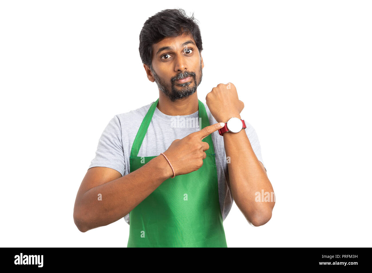 Bossy supermarket or hypermarket indian employee pointing wristwatch as ...