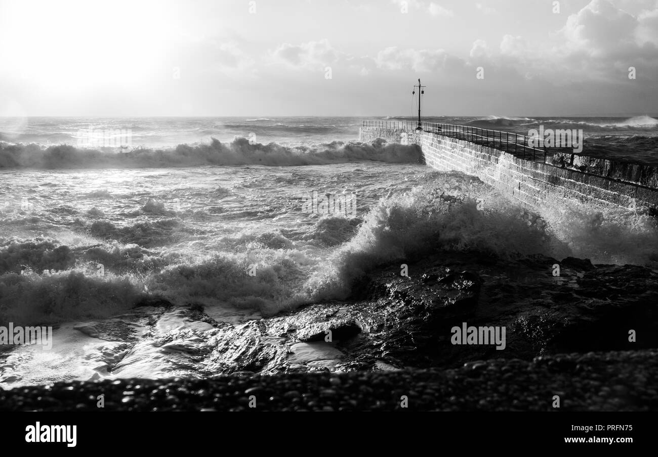Black and White image of Huge foaming storm 30 foot waves battering ...