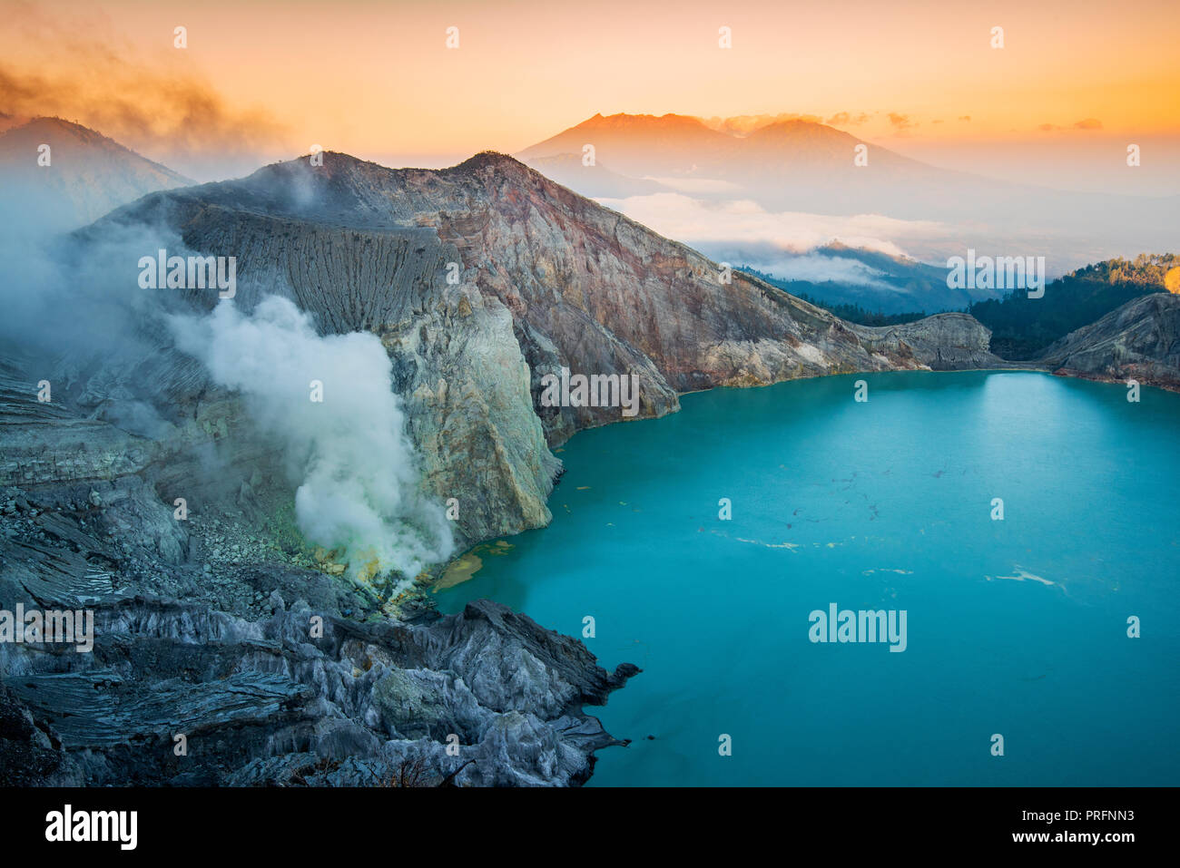 Kawah Ijen volcano and crater lake at sunrise, Java, Indonesia Stock Photo - Alamy