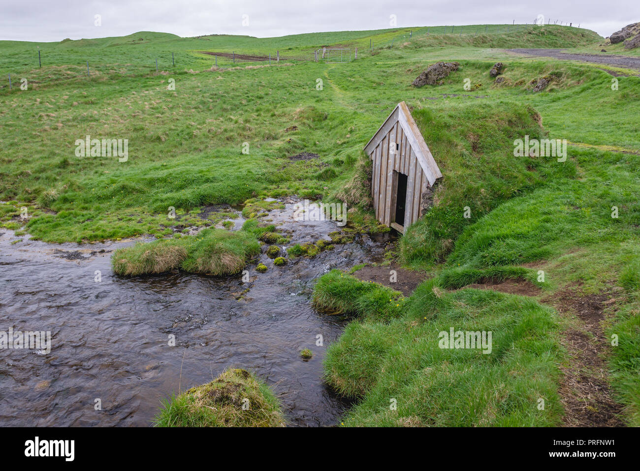 Small river next to Keldur Turf House museum in south part of Iceland ...