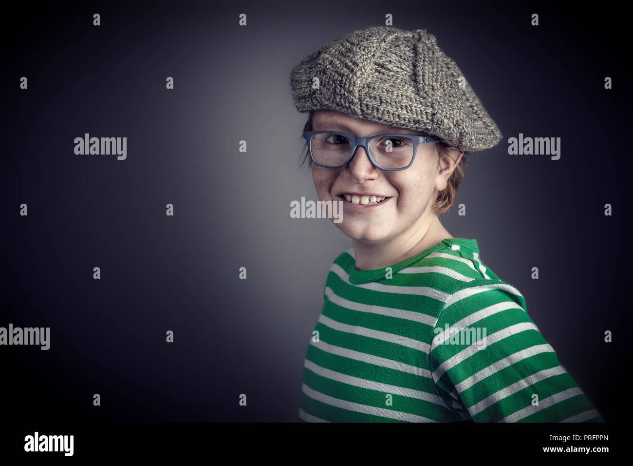 Boy with cap hi-res stock photography and images - Alamy