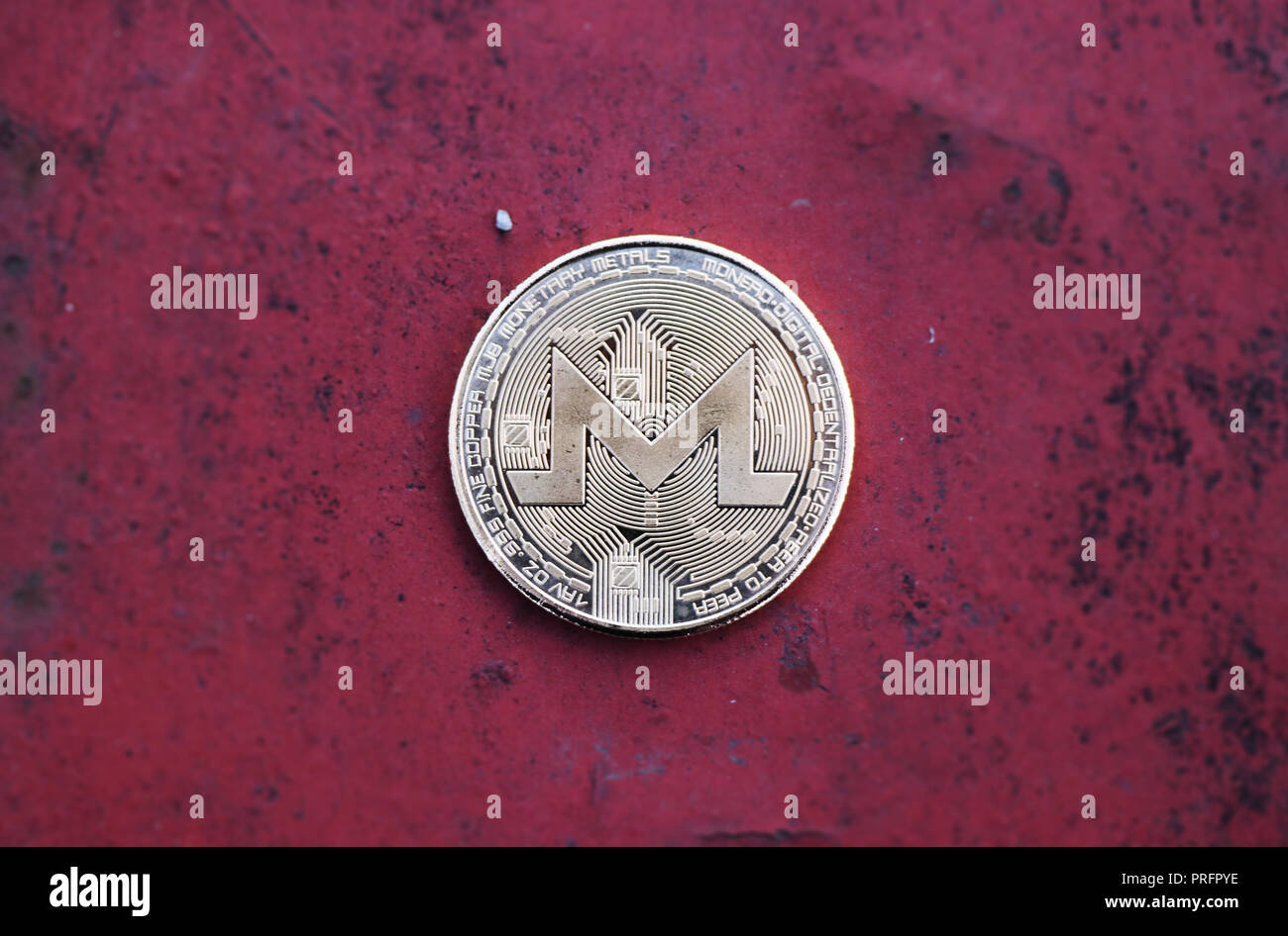 A one coin of monero. Internet coin for trading on market. Purple ...