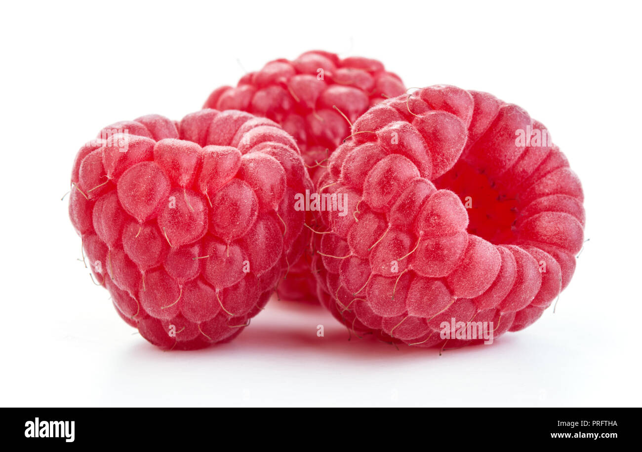 ripe raspberry fruits isolated on white background Stock Photo - Alamy