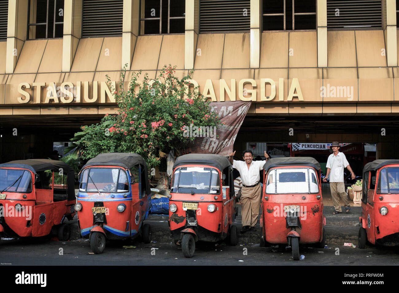 Bajaj auto rickshaws waiting for passengers outside Gondangdia train ...