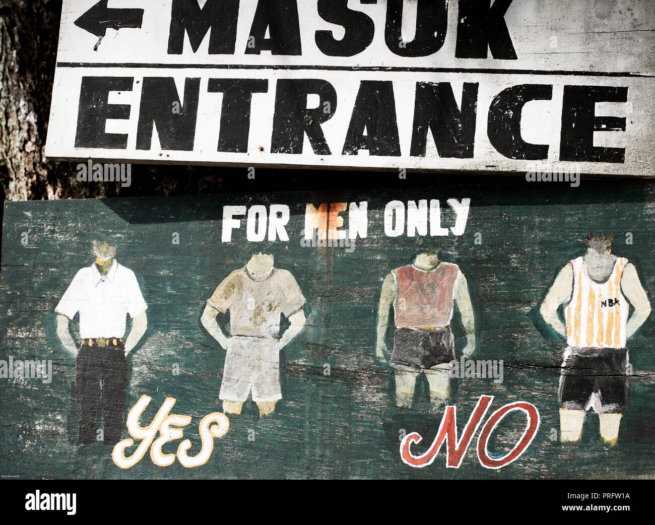 Mosque entrance sign with required dress code in Sumatra, Indonesia ...