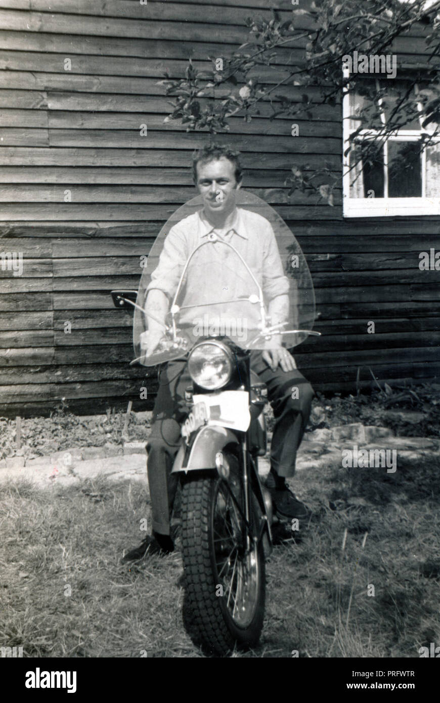 Man on 1950s Triumph motorcycle Stock Photo - Alamy