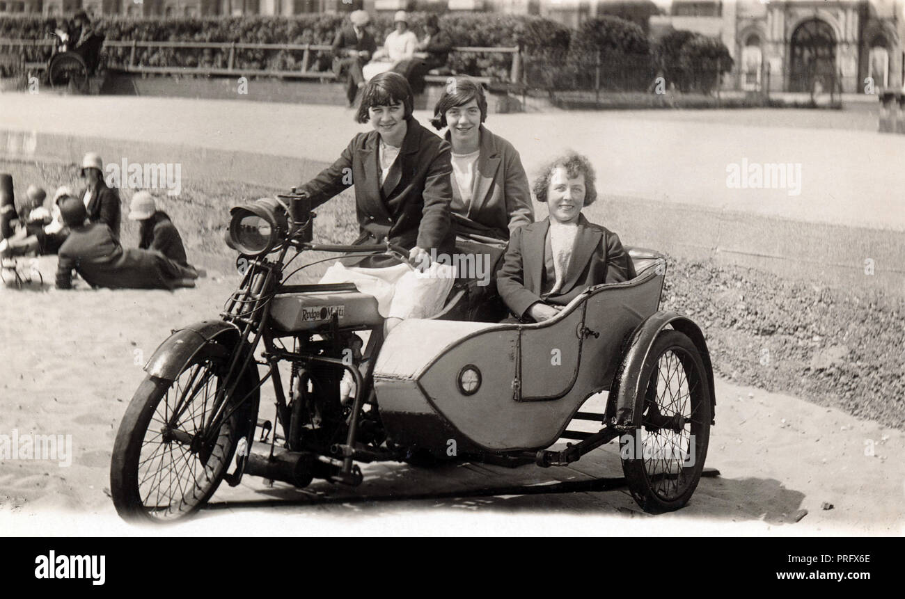 Three ladies at the seaside sitting on a 1923 Rudge Multi 500cc side ...