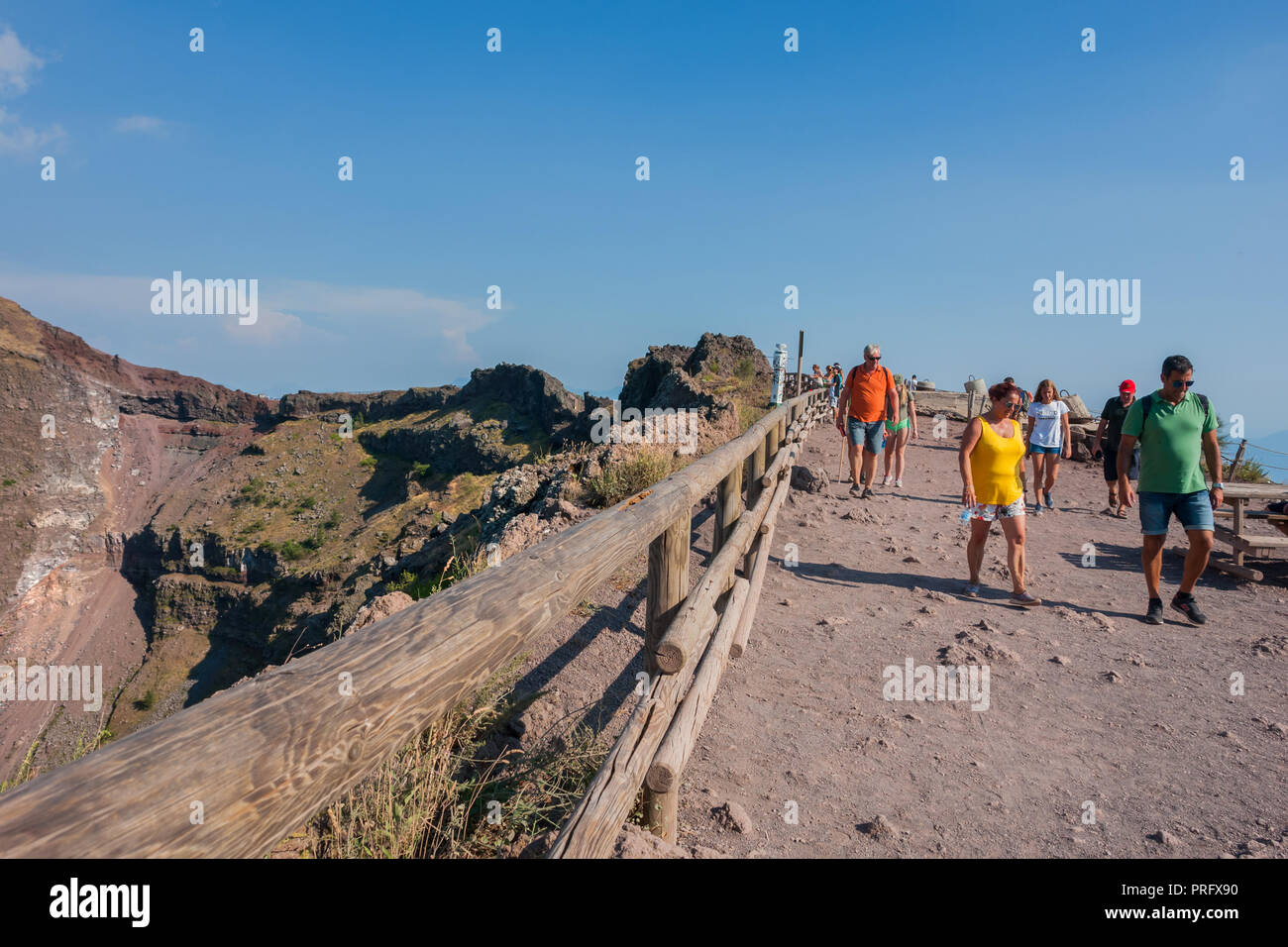 MOUNT VESUVIUS, ITALY - AUGUST 1, 2018: Tourists walk around the crater ...