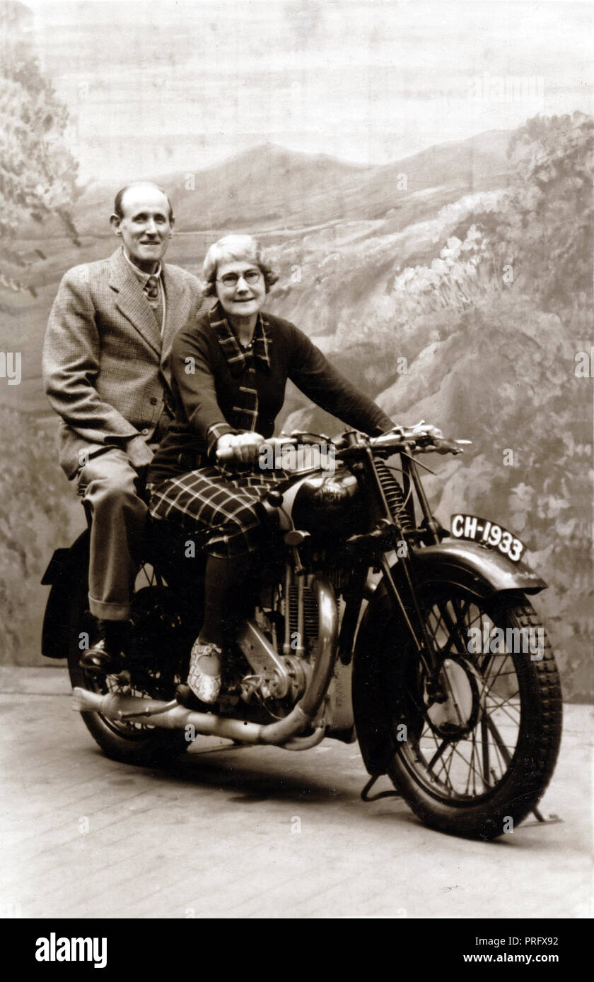 Lady and gentleman sat on a 1929 Coventry Eagle Flying 500cc motorcycle ...