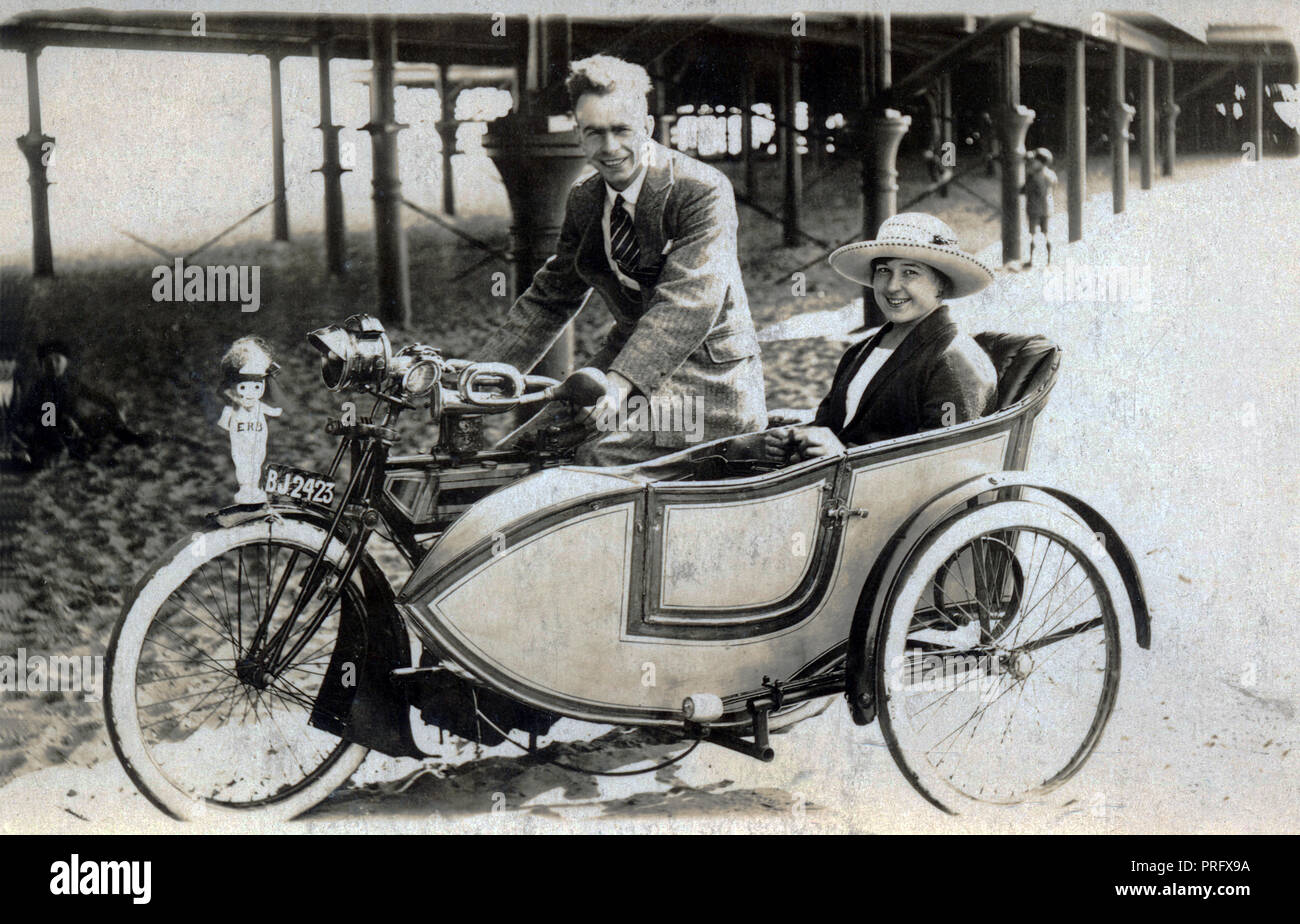 Gentleman & lady on a 1914 Triumph Model H motorcycle & sidecar on the ...