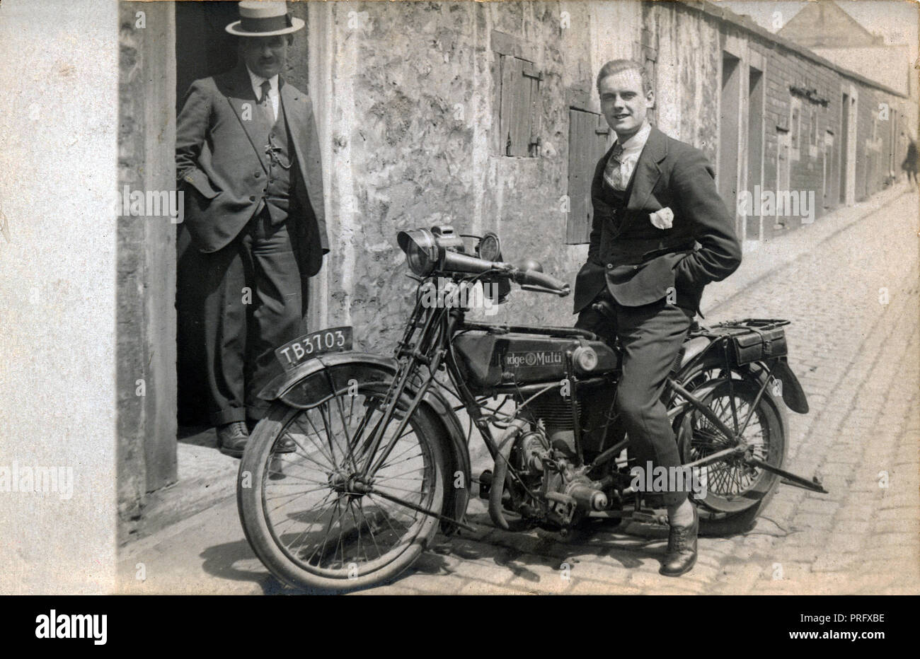 Gentleman on a 1918/20 Rudge Multi 500cc motorcycle in the street circa ...