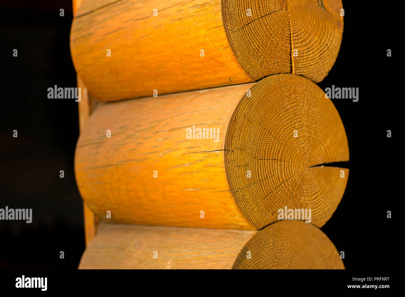 Wooden logs house vertical postcard background Stock Photo - Alamy