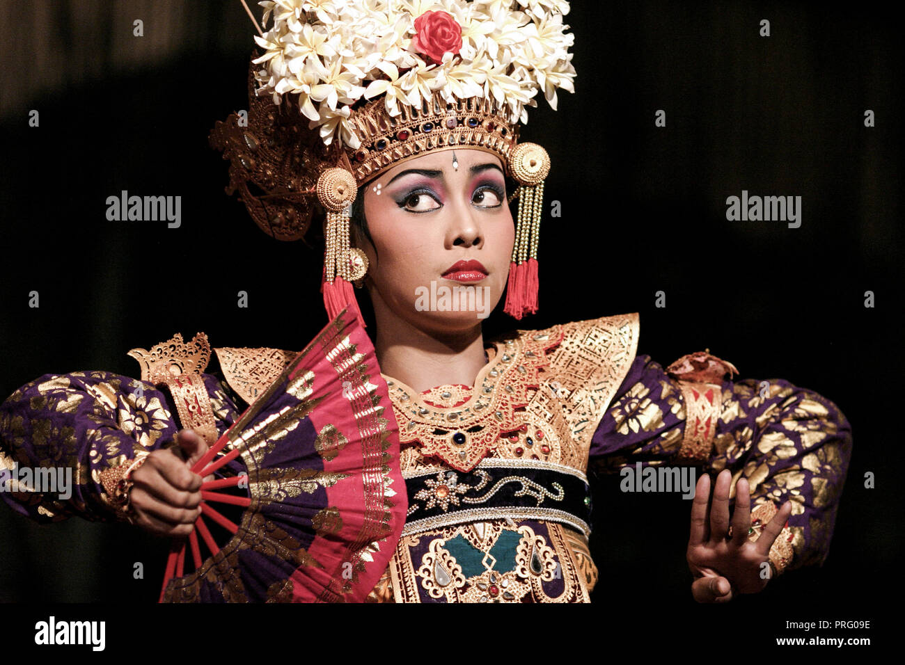 Female dancer in Balinese cultural dance performance, Denpasar ...