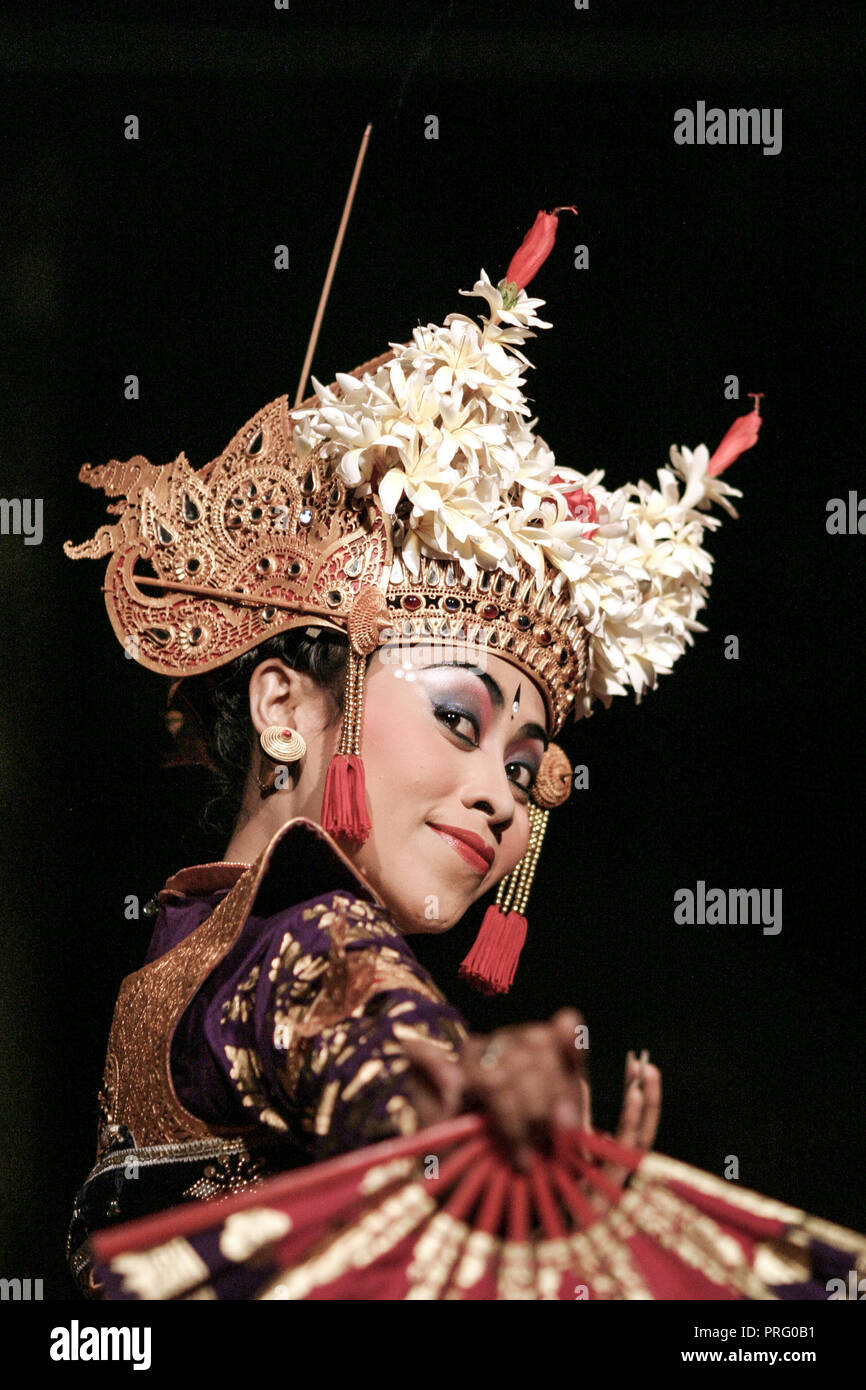 Female dancer in Balinese cultural dance performance, Denpasar ...