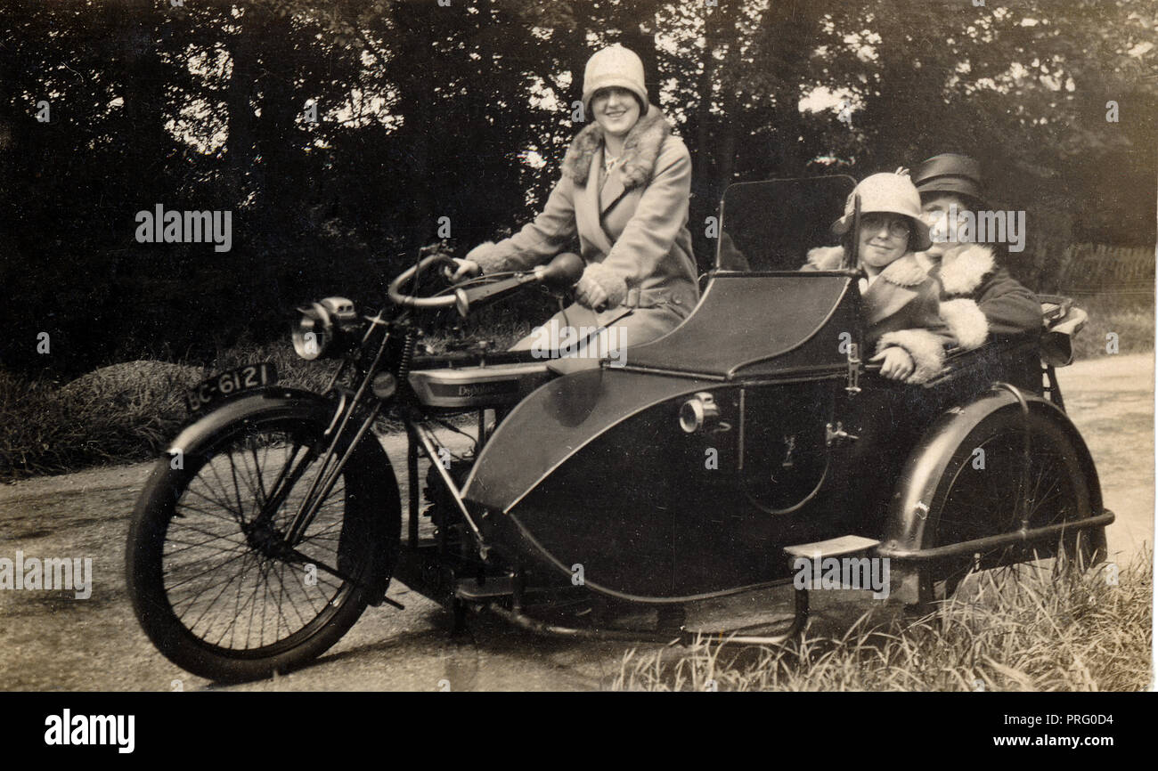 Three ladies on a 1914 Douglas 3.5 HP 500ccFlat Twin motorcycle ...