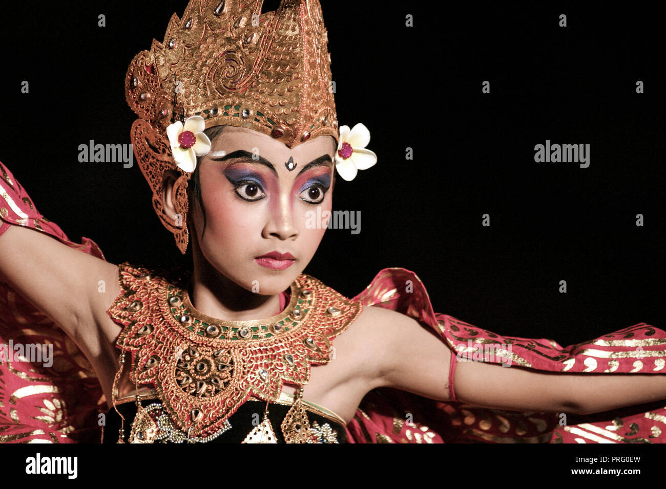 Female dancer in Balinese cultural dance performance, Denpasar ...