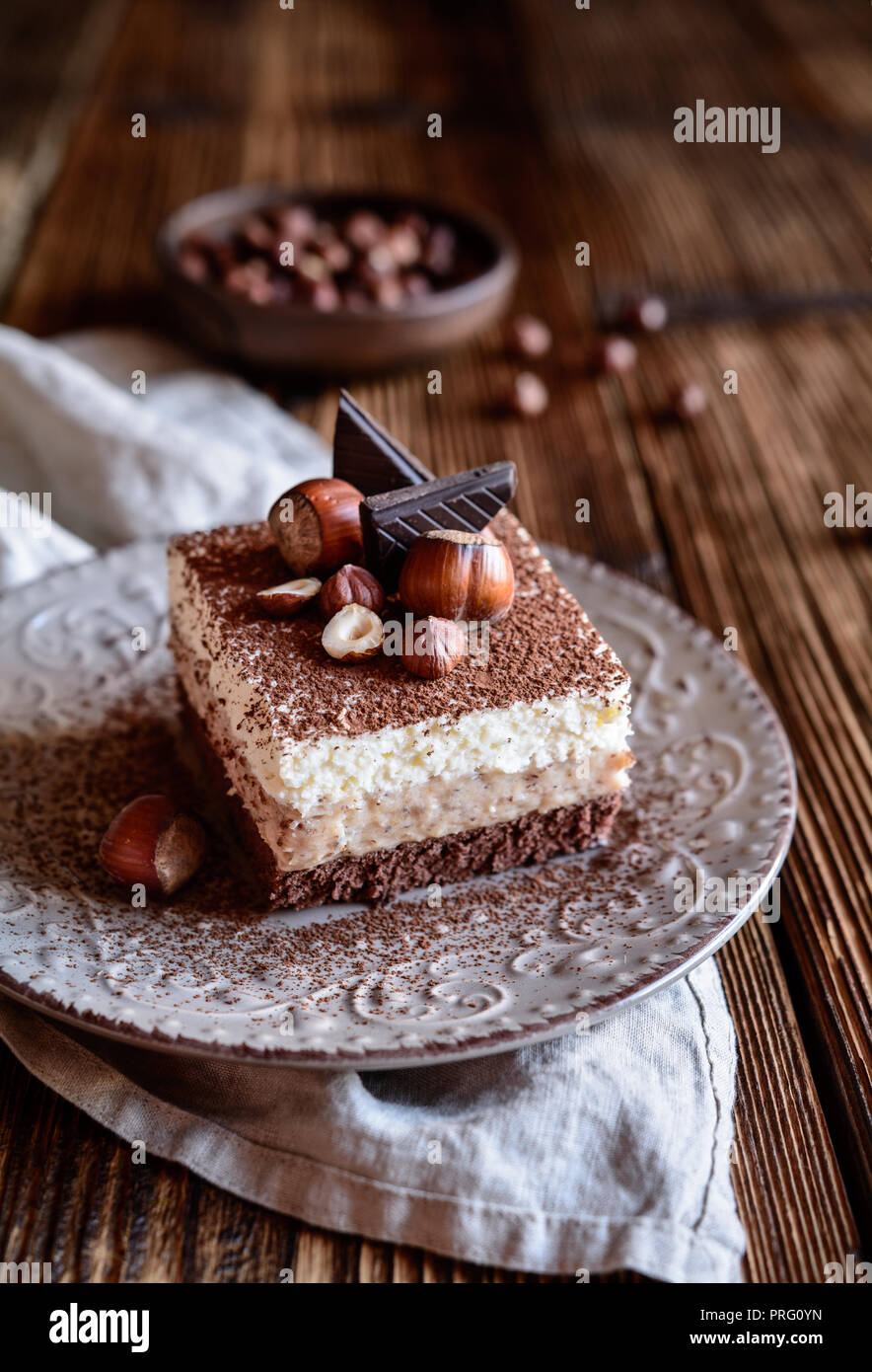 Delicious chocolate sponge cake with hazelnut and whipped cream layers ...
