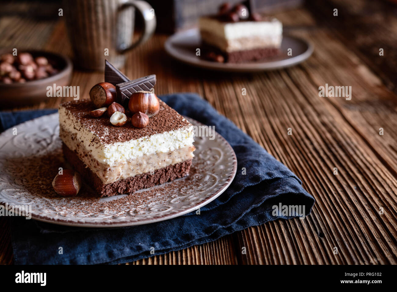 Delicious chocolate sponge cake with hazelnut and whipped cream layers ...